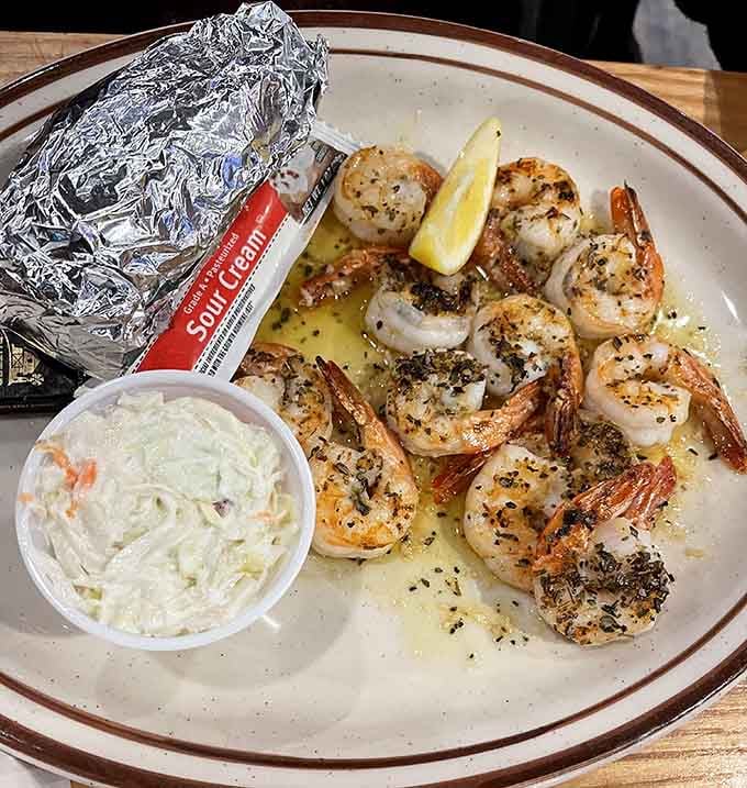 Shrimp scampi with garlic butter proves this barbecue joint knows its way around seafood too, surprisingly enough indeed.