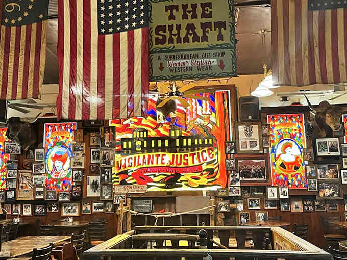 American flags frame "The Shaft" sign, a tribute to the mine that once defined this town's fortune and future.