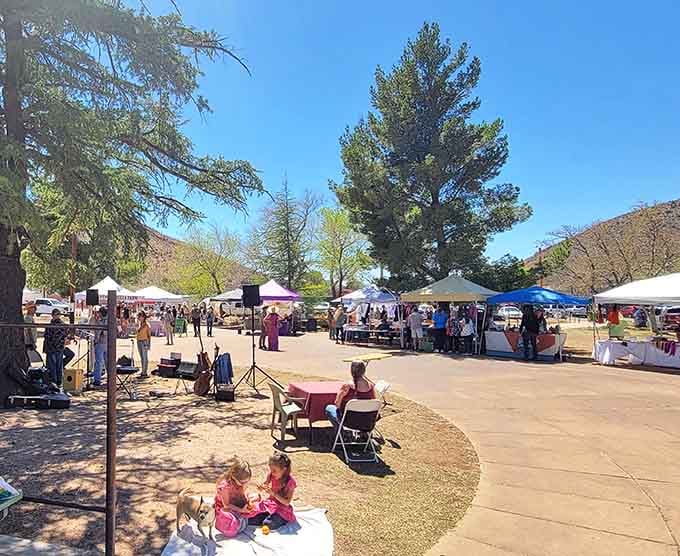 Community markets bring neighbors together under white tents, where local goods and friendly conversations flow freely.