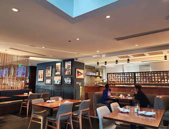 Happy diners enjoying their meals in a setting that encourages lingering over good food and conversation.