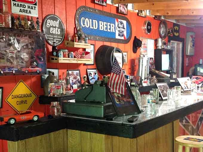 Cold beer signs and a tire-topped bar stool setup straight from your favorite honky-tonk dreams.
