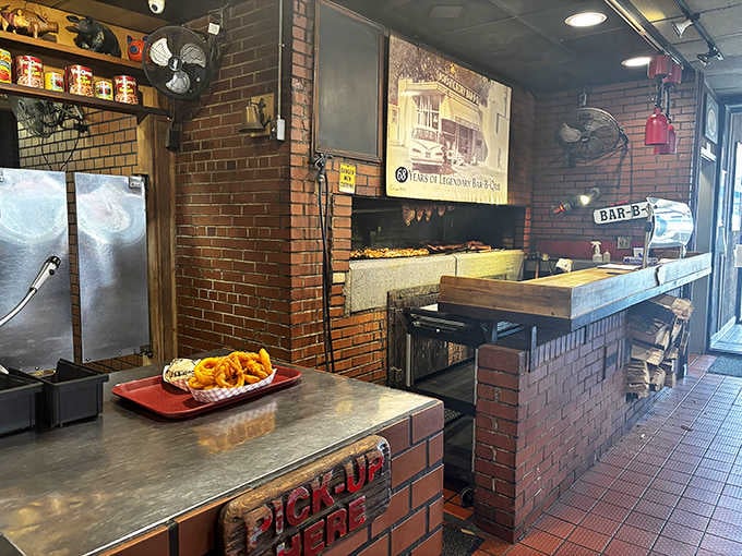 The indoor hickory pit with its brick construction is where the real magic happens every single day.