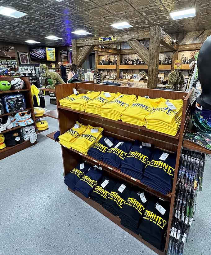 Stacks of yellow "The Thing?" t-shirts ready to confuse your friends and family back home in the best way.