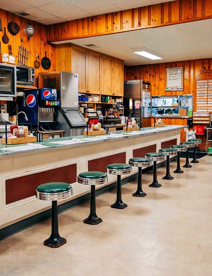 That classic counter with swivel stools invites solo diners to settle in and enjoy the show.