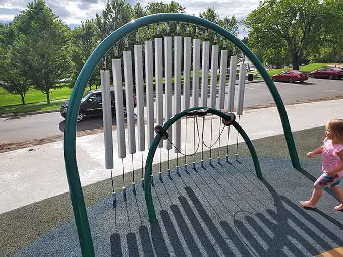 Giant chimes that turn curious kids into composers, one experimental bonk at a time, creating chaos.