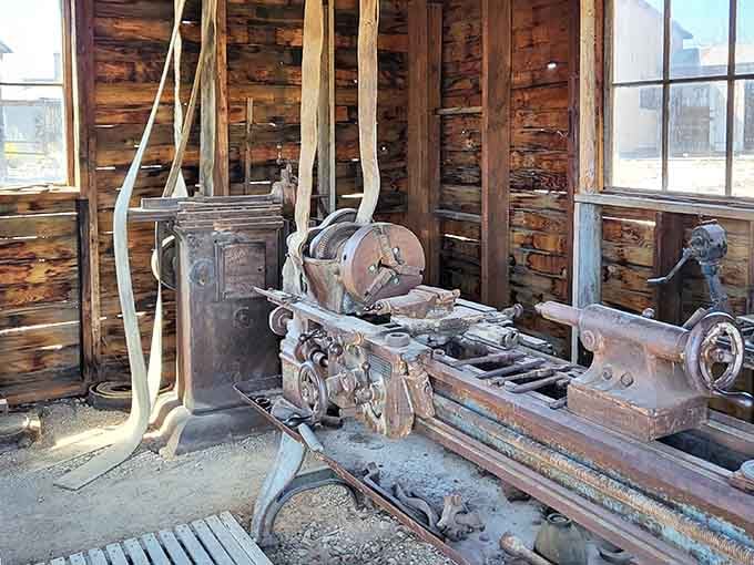 More antique machinery fills workshops where skilled craftsmen kept the mining operation running despite brutal desert conditions and isolation.