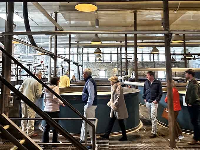Tour groups discover how grain becomes glory, learning secrets while surrounded by equipment that looks like steampunk art installations.