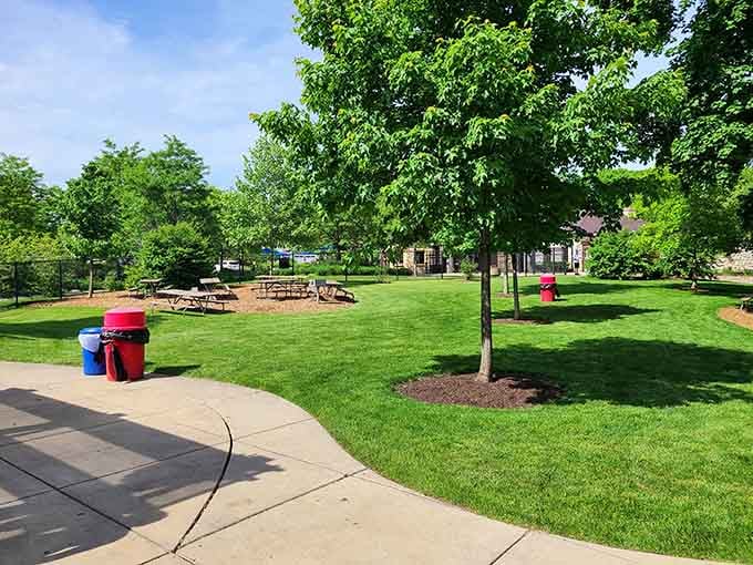 Perfectly manicured lawns and shaded picnic spots create breathing room around the water, preventing that sardine-can feeling of overcrowded summer pools.