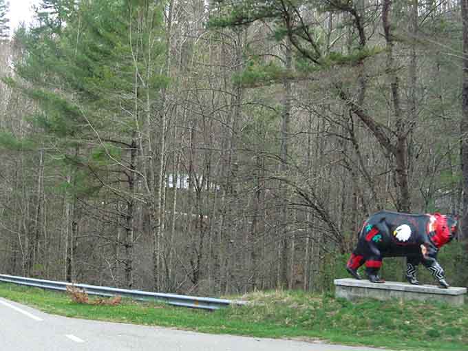 Even roadside sculptures pause to appreciate the view, capturing that universal moment when beauty stops you in your tracks completely.