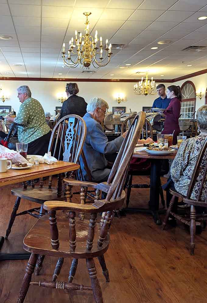 Real people enjoying real food in a dining room where conversation still trumps scrolling through phones.