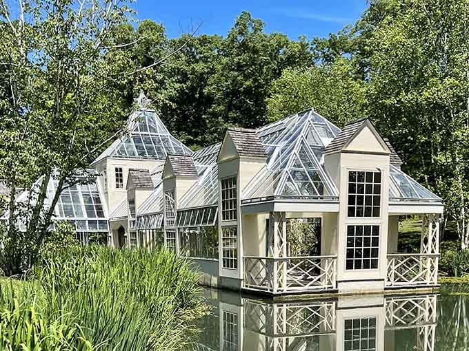 Stonecrop Gardens showcases a greenhouse so elegant it makes your backyard shed look like a storage disaster.