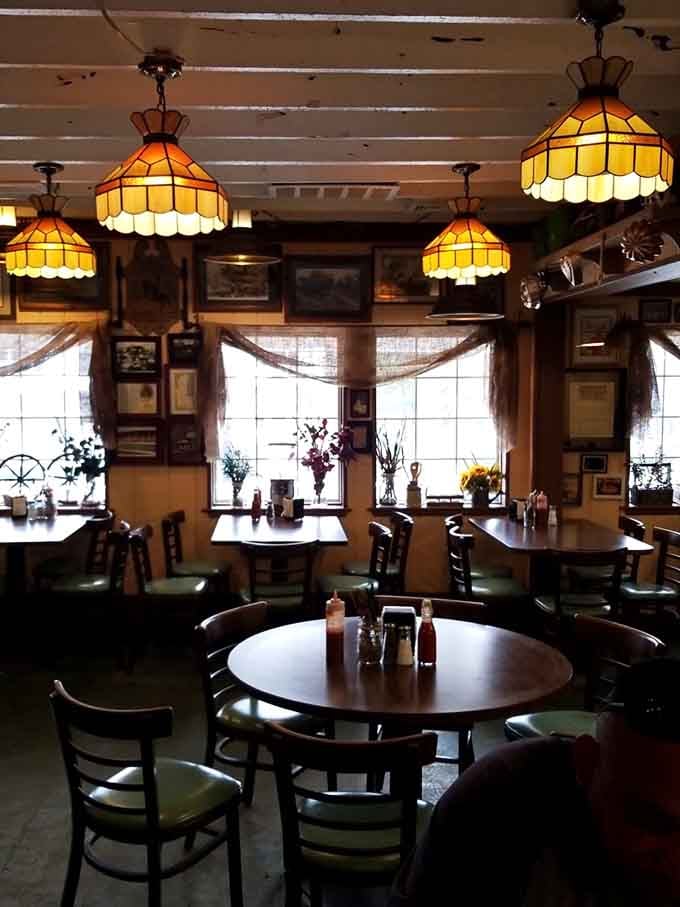 Tiffany-style lamps casting a warm glow over your meal, because even casual lunch deserves a little vintage elegance and charm.