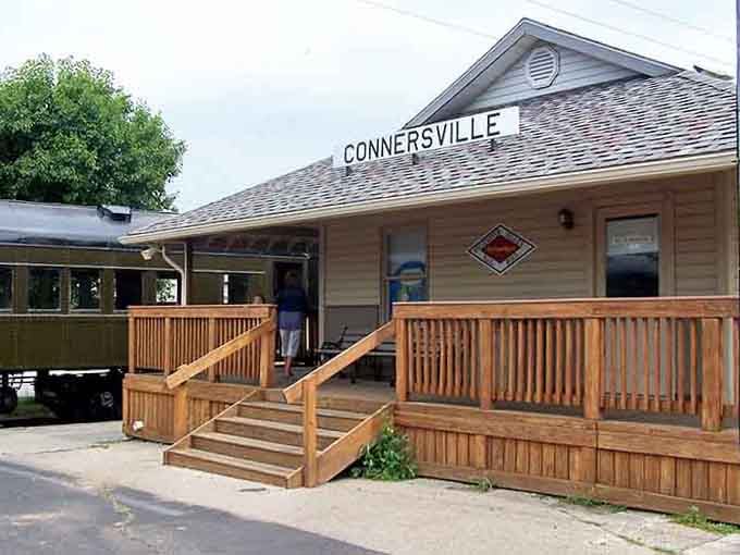 The vintage train depot welcomes visitors aboard, offering nostalgic journeys through countryside that modern life often overlooks completely.