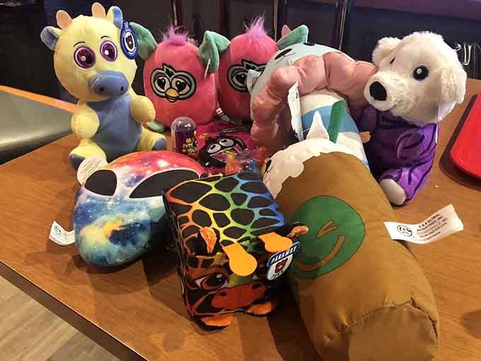 Stuffed animals and plush toys gather like they're planning the world's cutest convention &ndash; resistance is completely futile here.
