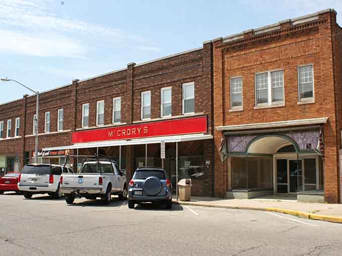 McCrory's vintage storefront reminds you that Main Street once thrived here, and some buildings still hold onto that nostalgic charm.