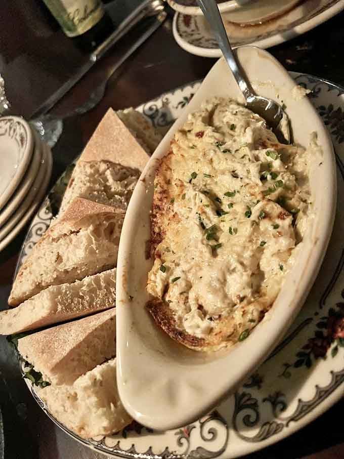 Warm crab dip with pita bread transforms appetizers into the main event you didn't know needed.
