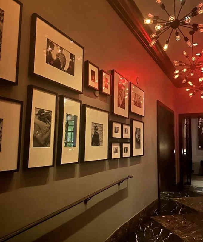 Classic photography lines the hallways, adding sophistication and visual interest as you make your way through this two-story treasure.