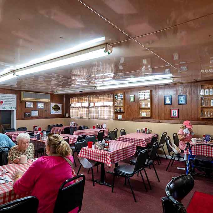 Spacious dining room with those iconic red checkered tables invites you to sit, relax, and remember when meals weren't rushed affairs.