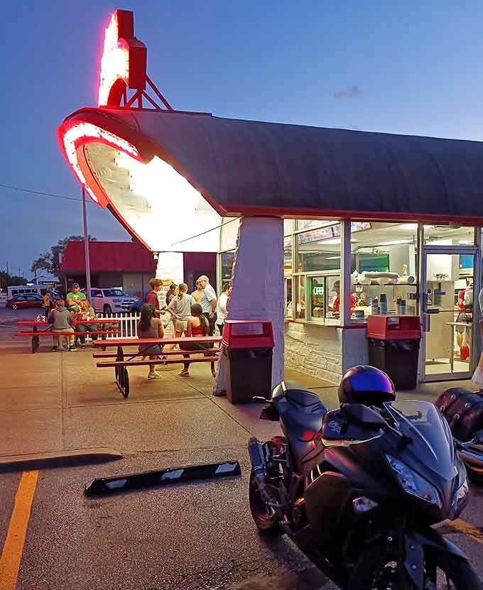 Evening crowds gathering under the lights create the kind of scene Norman Rockwell would have painted, probably.