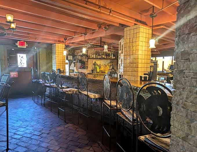 The bar area beckons with promises of perfectly mixed drinks and conversations that last longer than you planned.