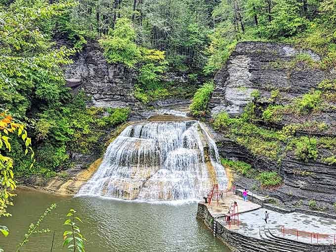 Rain brings out the vibrant greens and swells the waterfall, turning the gorge into a living, breathing masterpiece.