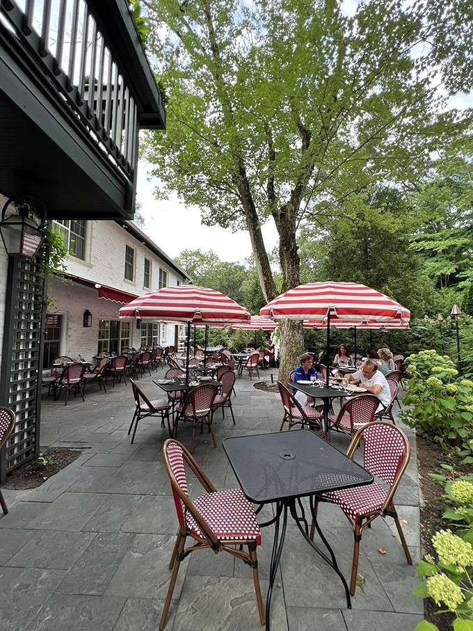 The outdoor seating offers European café vibes right here in Indiana, red umbrellas and all.