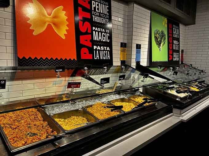 The pasta station offers multiple noodle varieties ready to become part of your personalized culinary masterpiece.