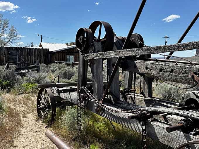 Historic mining equipment sits among the sagebrush, testament to the backbreaking work that defined this rugged landscape's economy.