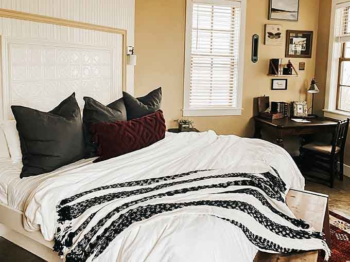 Cozy accommodations await with pillows so inviting you might forget to actually explore the town outside your door.