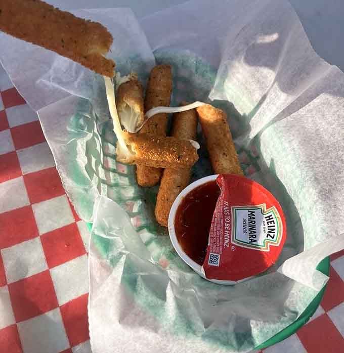 Mozzarella sticks in a paper basket: proof that some classics never need updating or improvement.