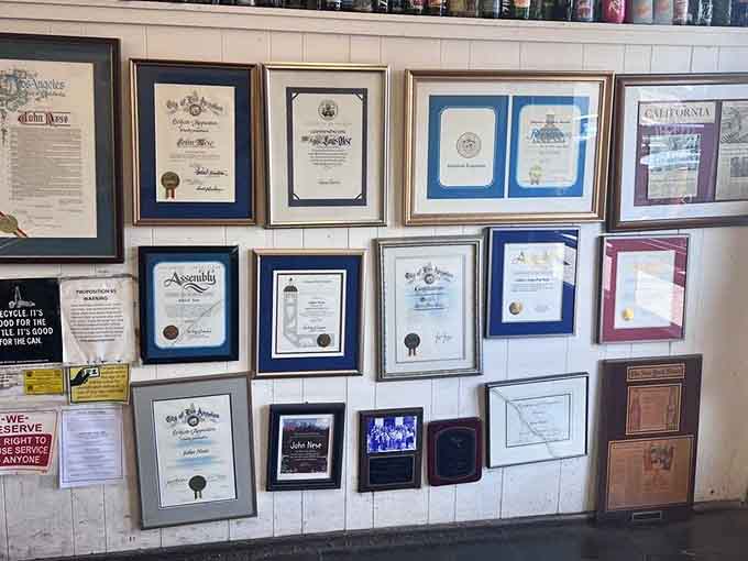 Awards and certificates cover the wall like proud report cards, proof that excellence doesn't go unnoticed in Highland Park.