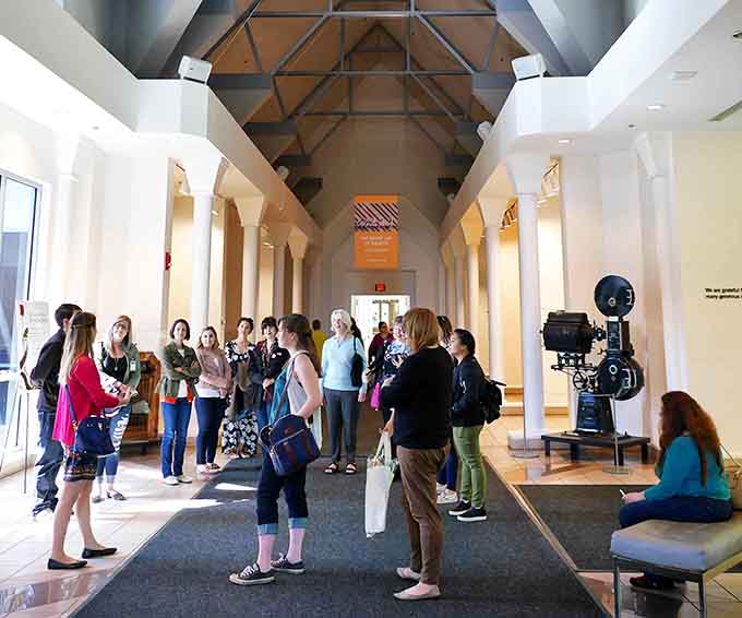 Tour groups gather where history and innovation collide in one of photography's most important museums.