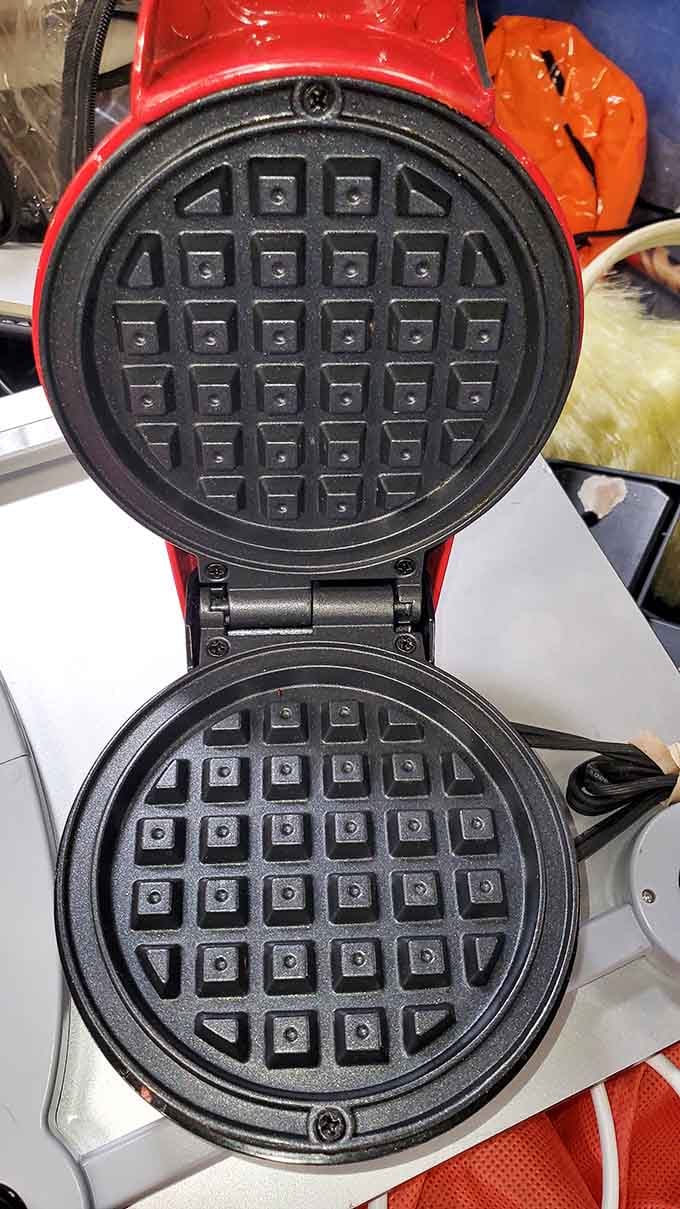 A perfectly good waffle maker sits waiting to create Sunday morning breakfast magic in its next lucky home.