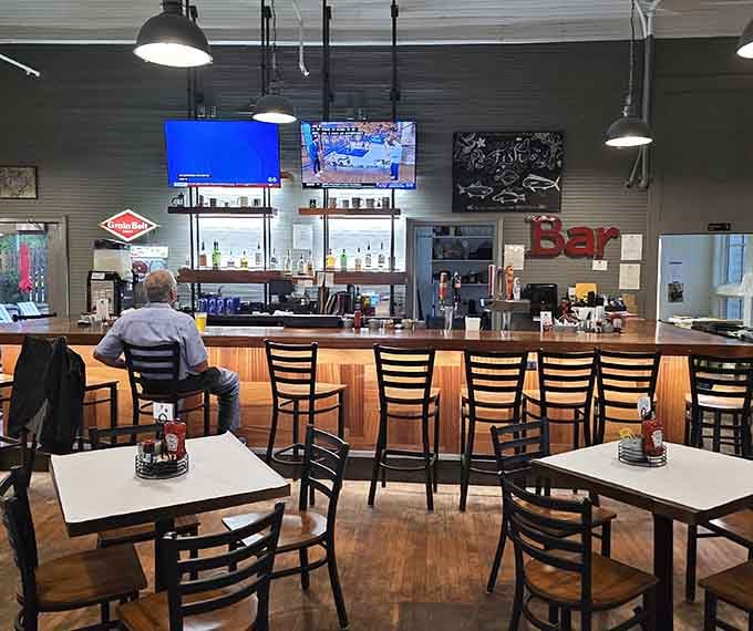 The bar area offers front-row seats to watch the magic happen while you sip something cold.