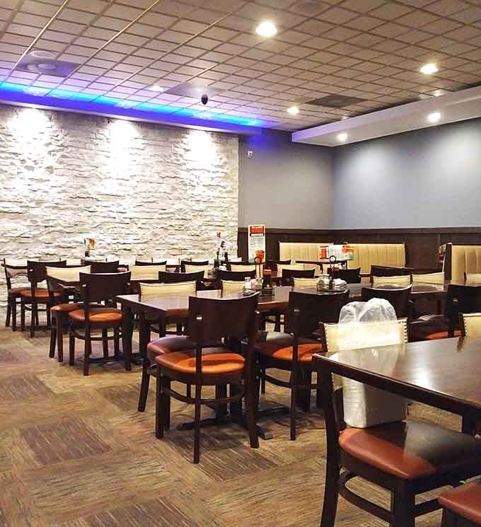 Booth seating and ambient lighting create the perfect setting for your multi-plate marathon dining session ahead.