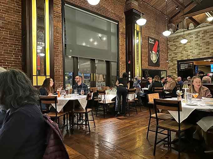 Happy diners enjoying their meals in a space that encourages lingering over food and actual human conversation, imagine that.