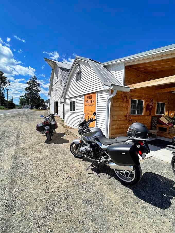 That vintage white building with motorcycles parked outside suggests ice cream tastes better when served with character.