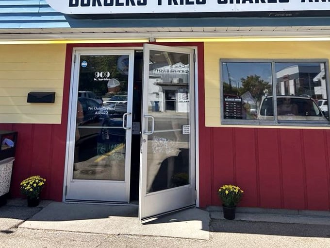 Red trim meets yellow siding in a color scheme that says "we're here to feed you, not win design awards."