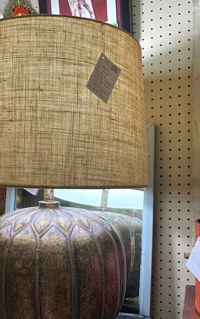 That textured lampshade screams mid-century modern and would instantly upgrade any living room's ambiance dramatically.