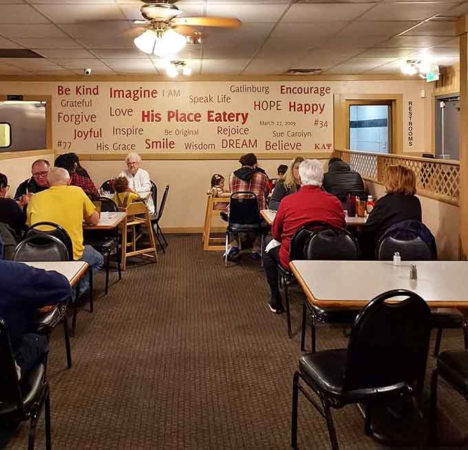 Happy diners surrounded by motivational words, proving that good food really does inspire hope, joy, and second helpings.