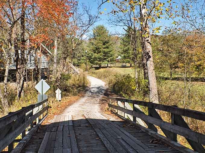 The wooden planks whisper stories of horse-drawn wagons and Model T's that once rumbled across.