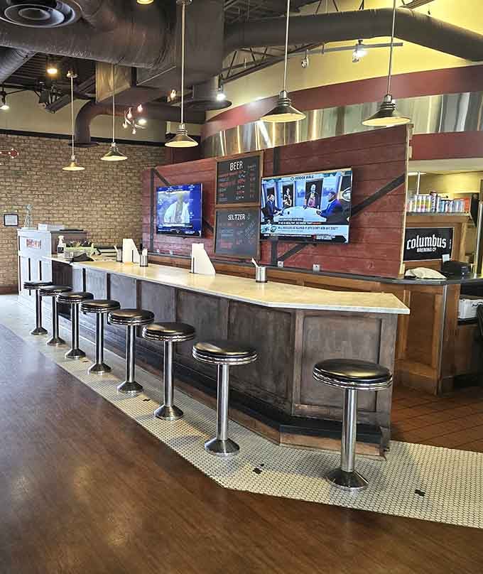Counter seating with TVs means you can watch the game while contemplating your next order.