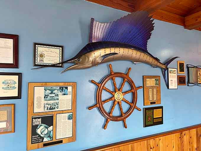 That sailfish and ship's wheel aren't just props, they're reminders you're eating where the ocean meets plate.