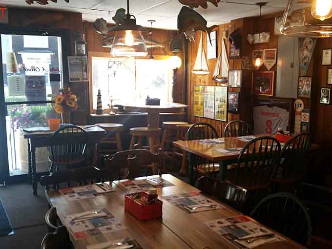 Wooden tables and eclectic decor create the kind of cozy atmosphere where strangers become friends over shared burger enthusiasm.