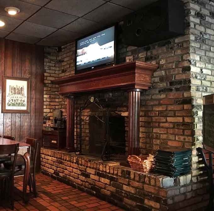 That brick fireplace adds rustic charm while you wait for your perfectly cooked prime rib to arrive.