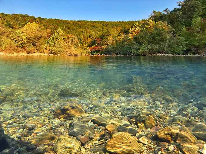 Autumn reflections in impossibly clear water showcase the park's beauty when summer crowds have departed.