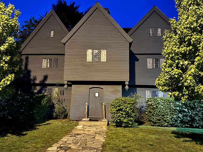 Illuminated at night, the house looks like it's auditioning for every horror movie ever made.