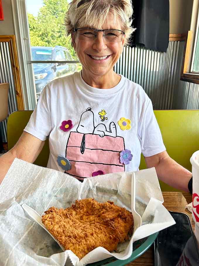 That smile says it all when you're about to tackle a tenderloin bigger than most dinner plates ever made.