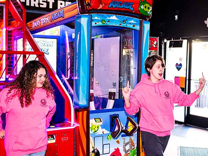 Pure concentration radiates from these players, their competitive spirits alive and thriving in this wonderfully nostalgic arcade atmosphere.