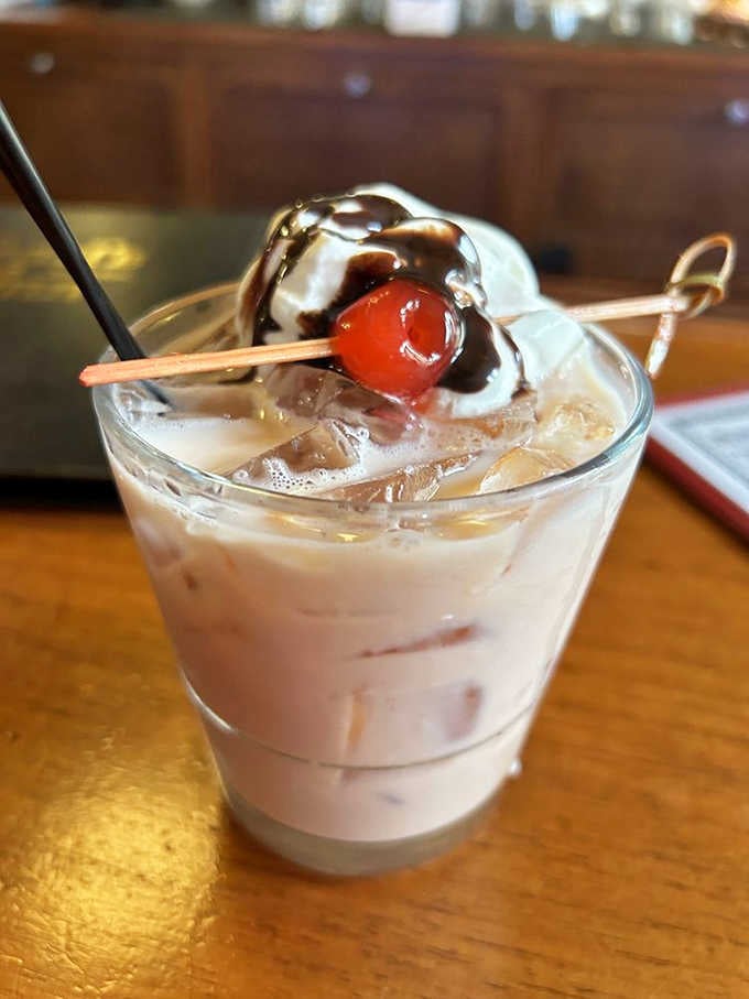 That chocolate cake martini comes with whipped cream and a cherry, because dessert should always be dramatic.